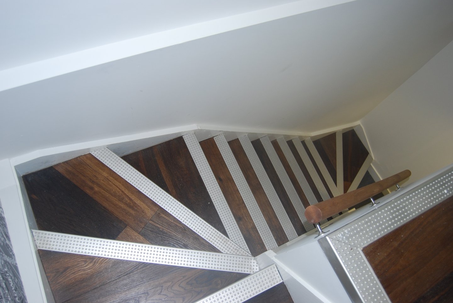 Cladding Stairs with Fumed Oak & Metal Inserts | Case Study